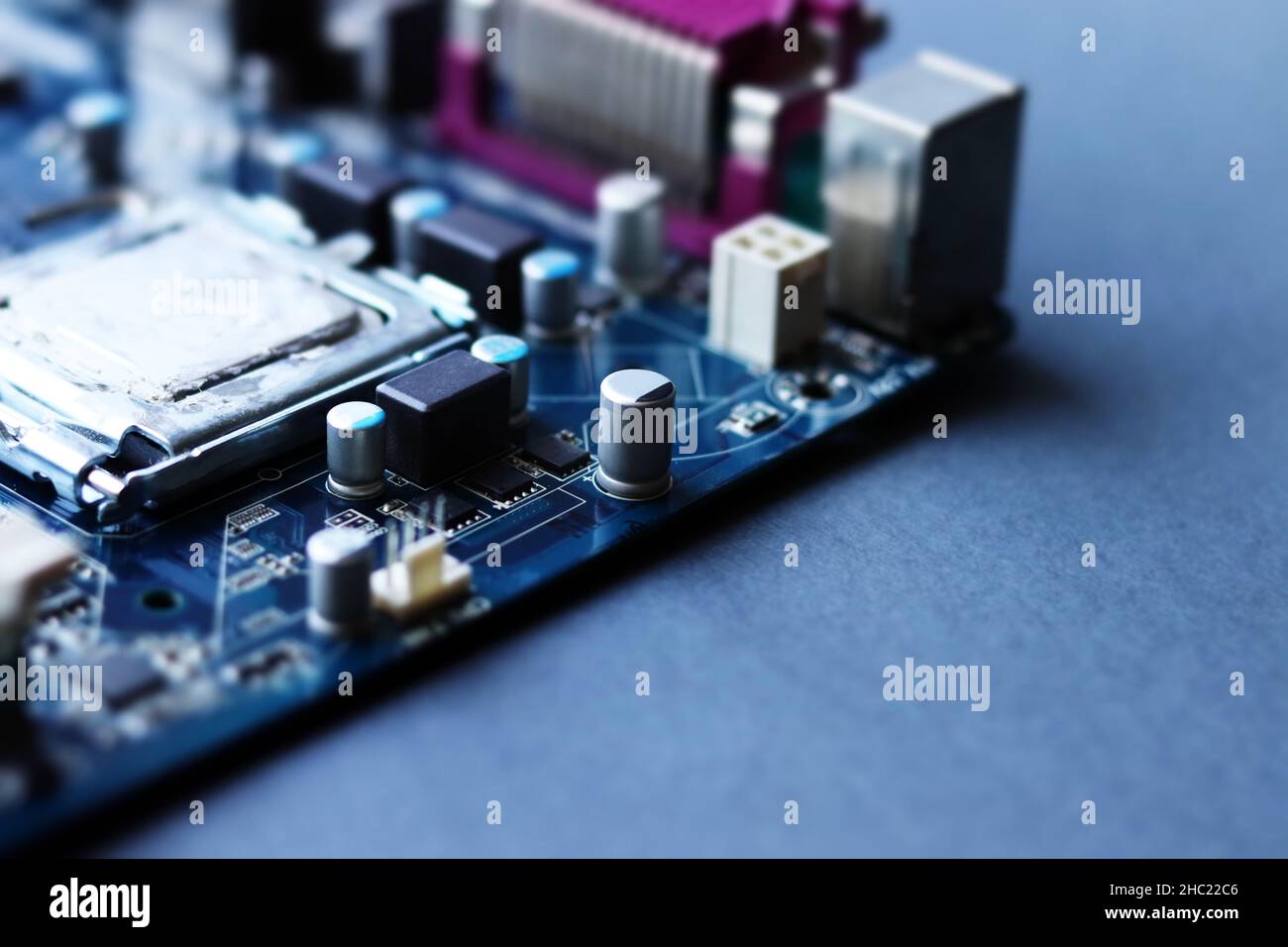 Blurred computer motherboard closeup in tilt shift style with selective ...