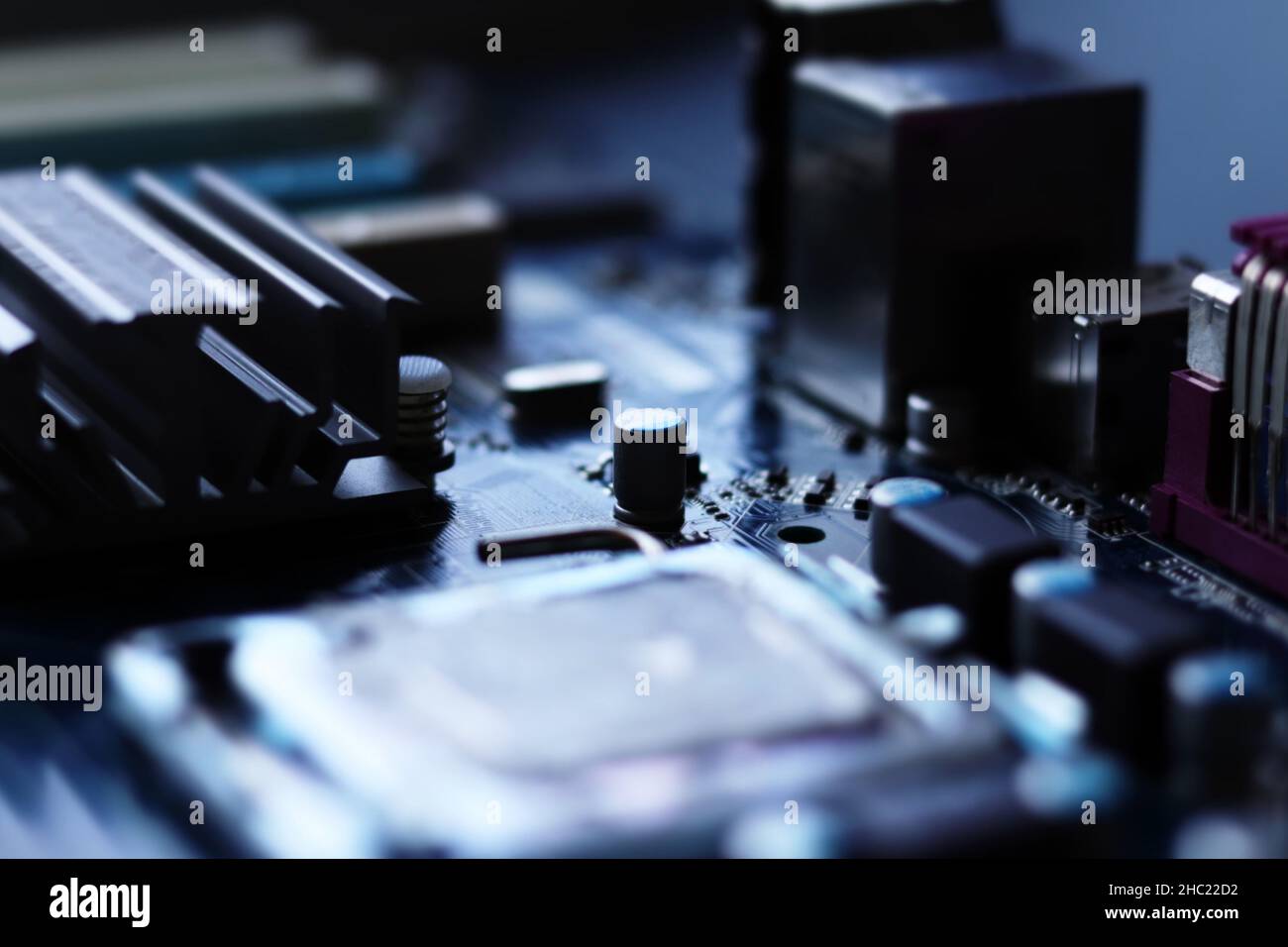 Blurred computer motherboard closeup in tilt shift style with selective ...