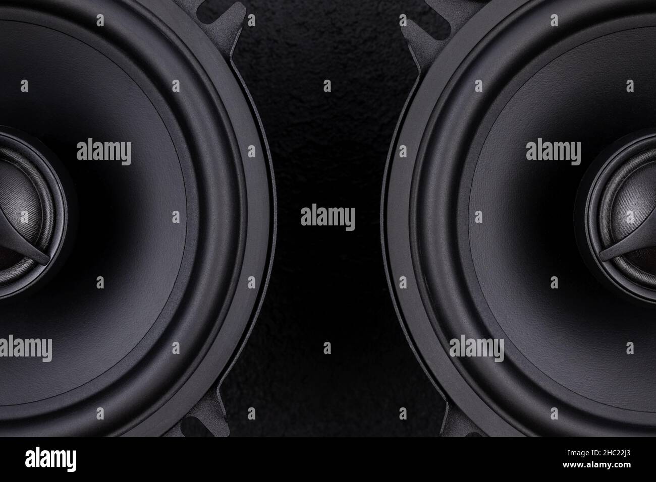 Stylish car audio acoustic round speakers on dark black background ...