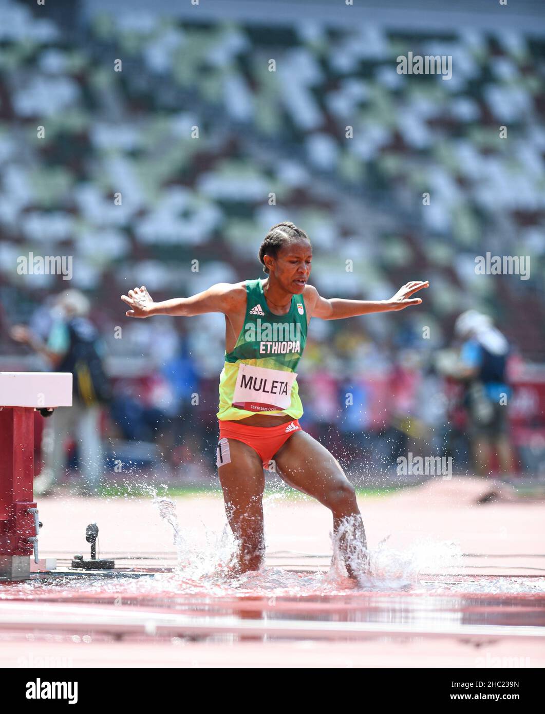 Lomi Muleta participating in the 3000 meters steeplechase at the 2020 ...