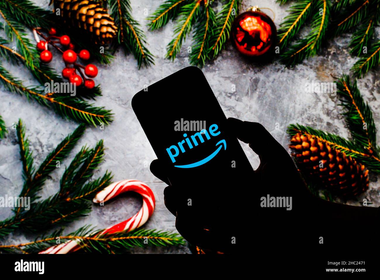 In this photo illustration a Amazon Prime logo seen displayed on a ...