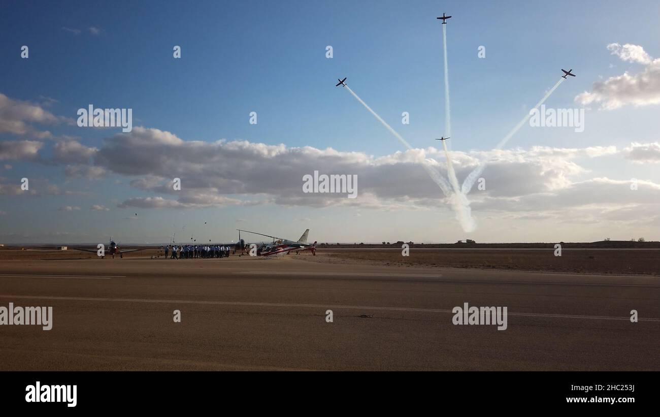Hatzerim, Israel. 22th Dec, 2021. New military pilots throw their hats ...