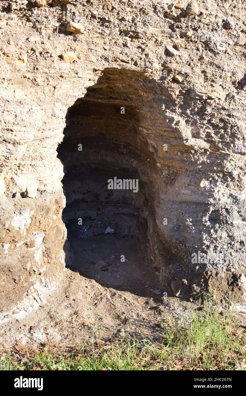 cave in a volcano cliff Stock Photo - Alamy