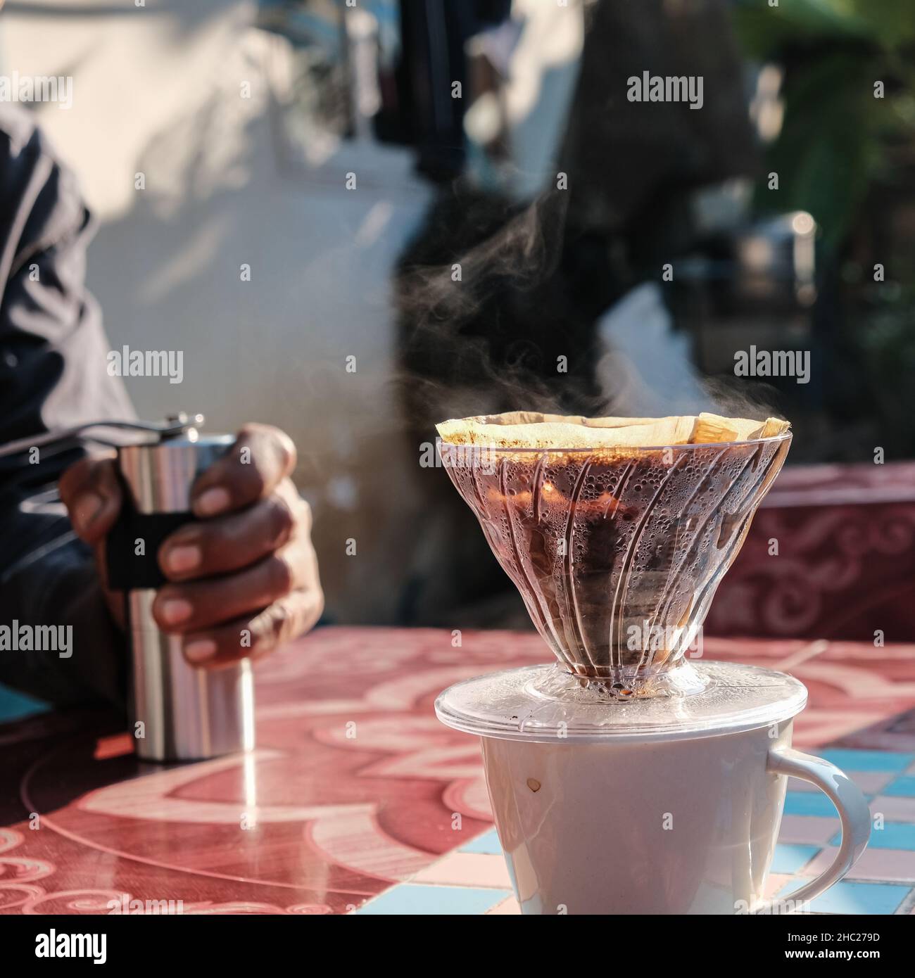 Coffee drip and smoke with group of people friend hand grind coffee in ...