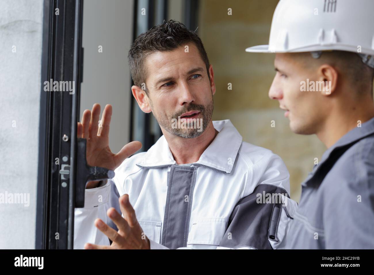 people talking during windows installation Stock Photo - Alamy