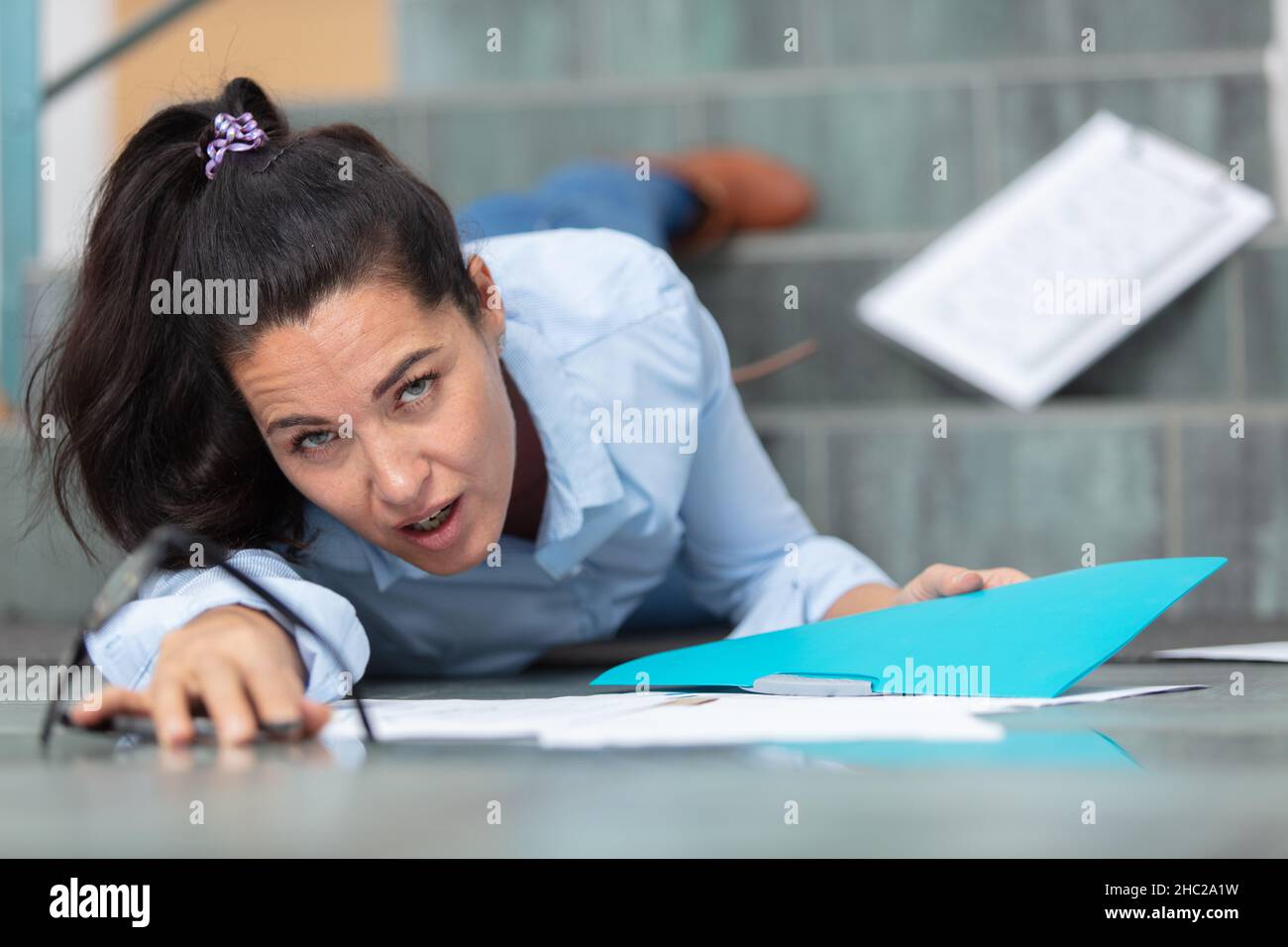 businesswoman falling down the stairs at office Stock Photo - Alamy