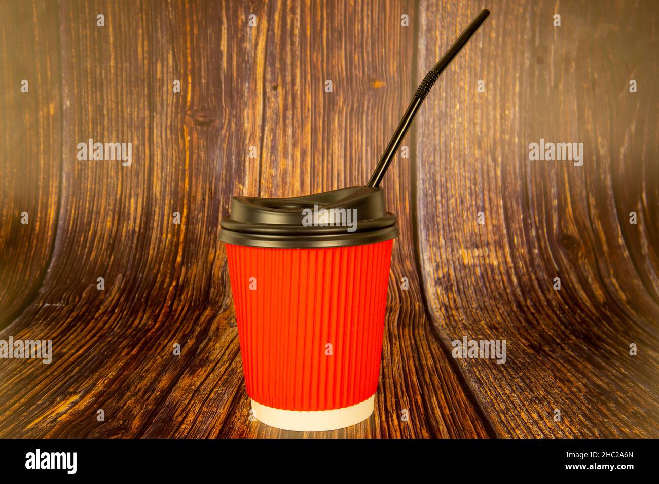 Red paper coffee cup with a tube Stock Photo - Alamy