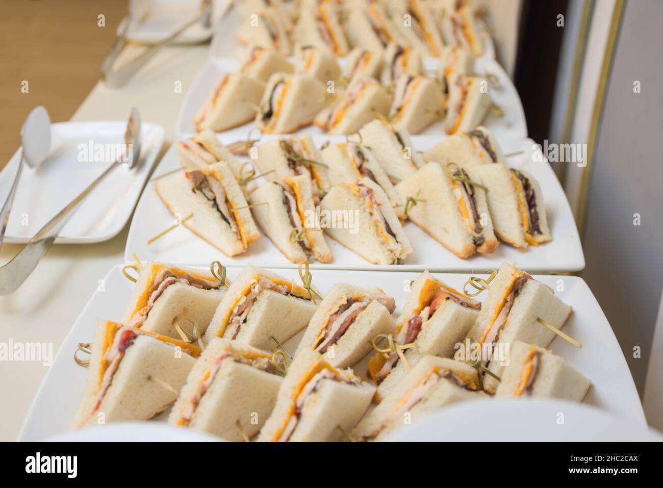Club sandwiches delivered for catering on venue.Delicious fresh snacks ...