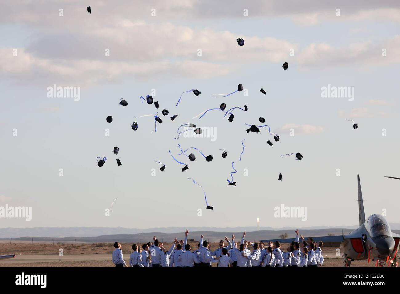 Be'er Sheva. 22nd Dec, 2021. Cadets toss their caps during a pilots ...