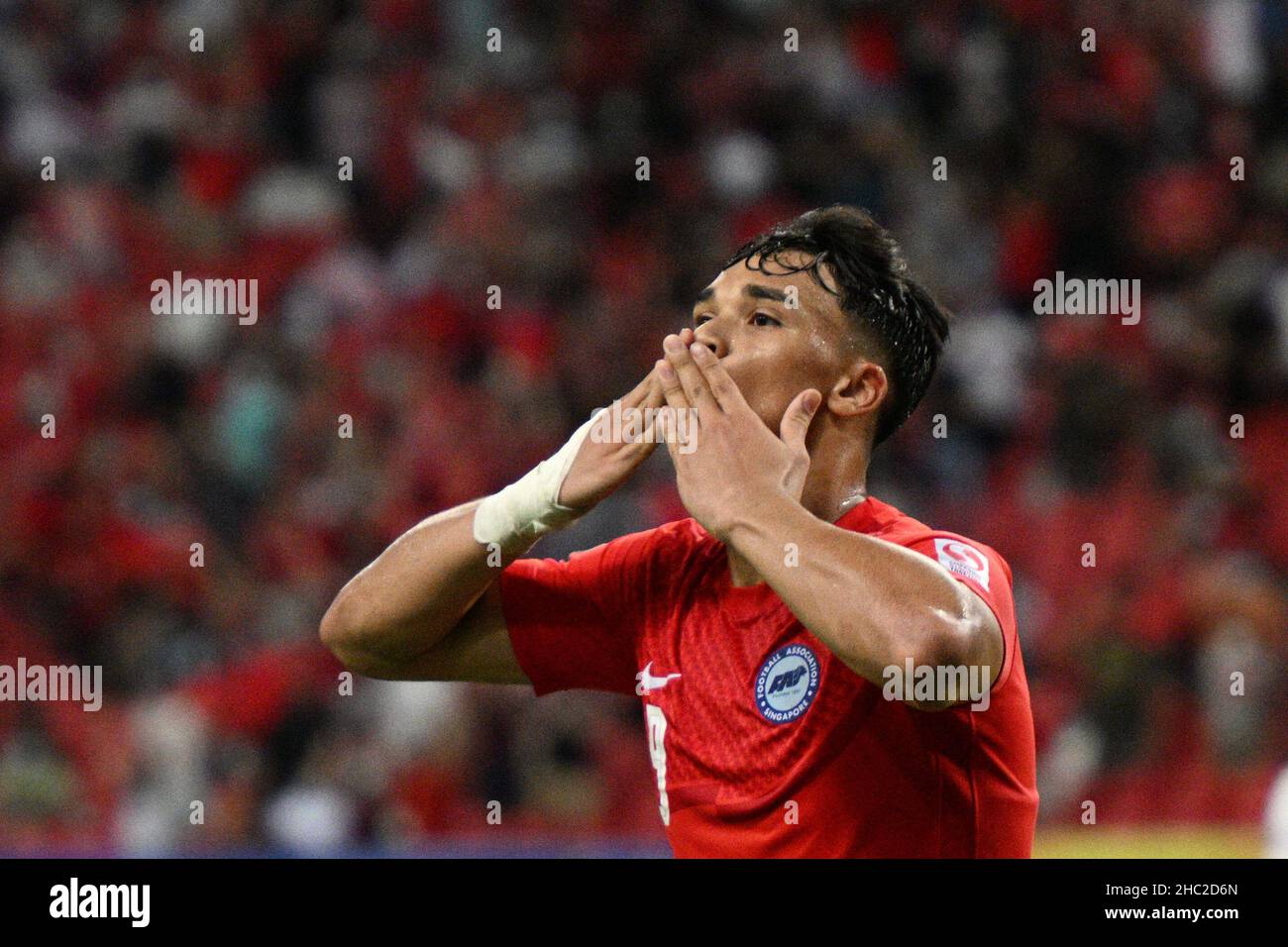 (211223) --, Dec. 23, 2021 (Xinhua) -- Ikhsan Fandi of Singapore ...