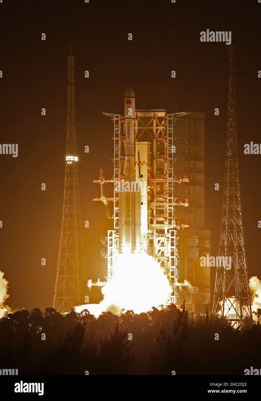 Wenchang. 23rd Dec, 2021. A Long March-7A rocket carrying two ...
