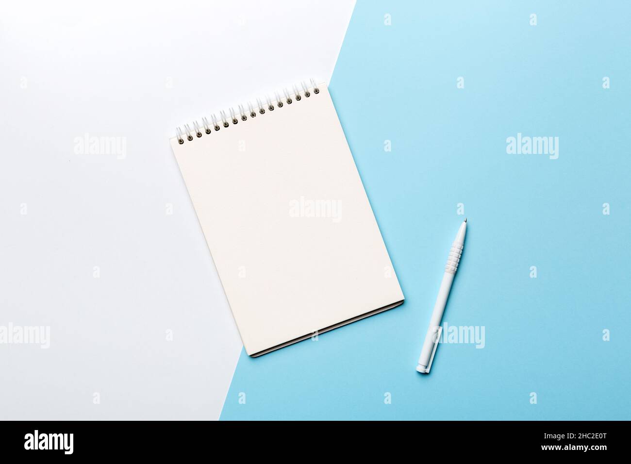 Blank notebook with pen on white background. Back to school and ...