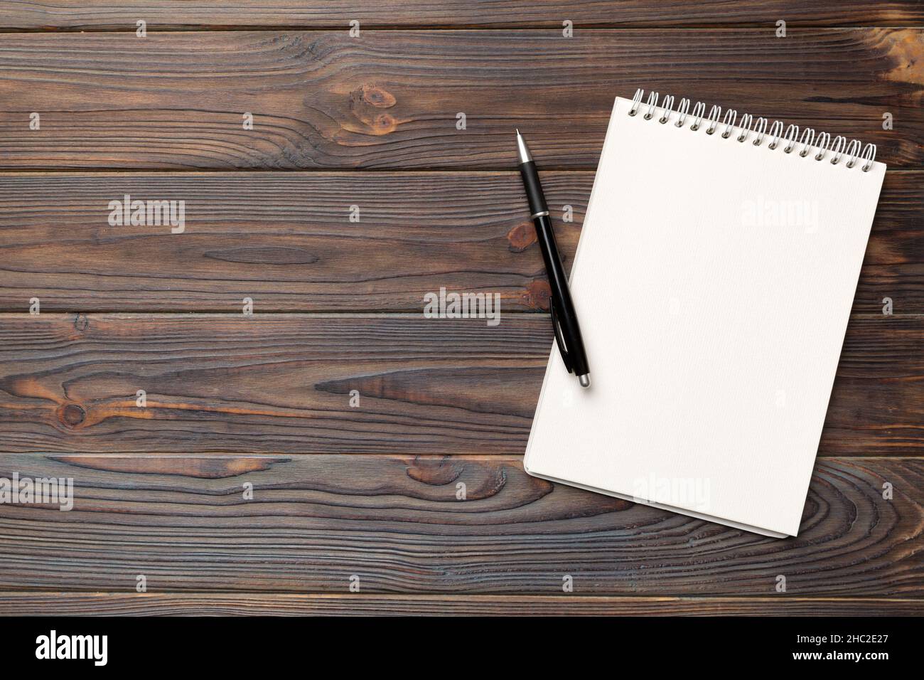 Blank notebook with pen on white background. Back to school and ...