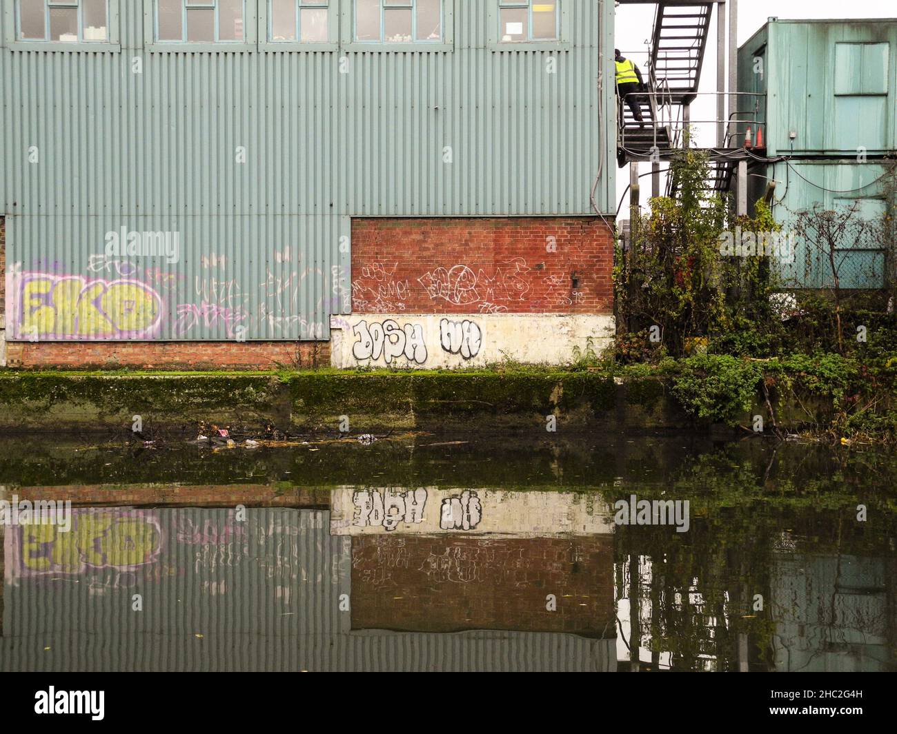 Colourful reflections from industrial warehouses along the Grand Union ...
