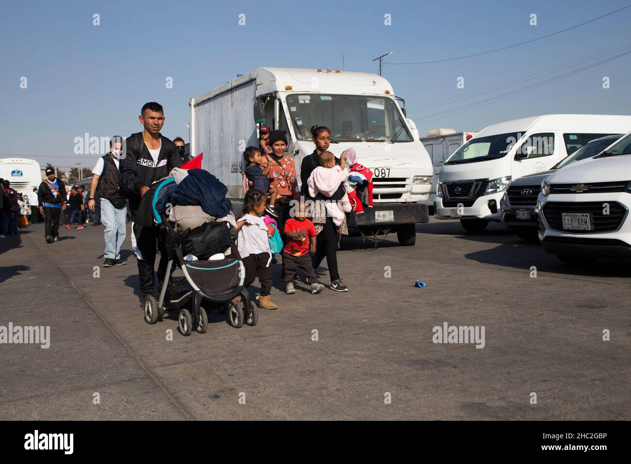 (12/22/2021) Members of the migrant caravan continue their journey to ...
