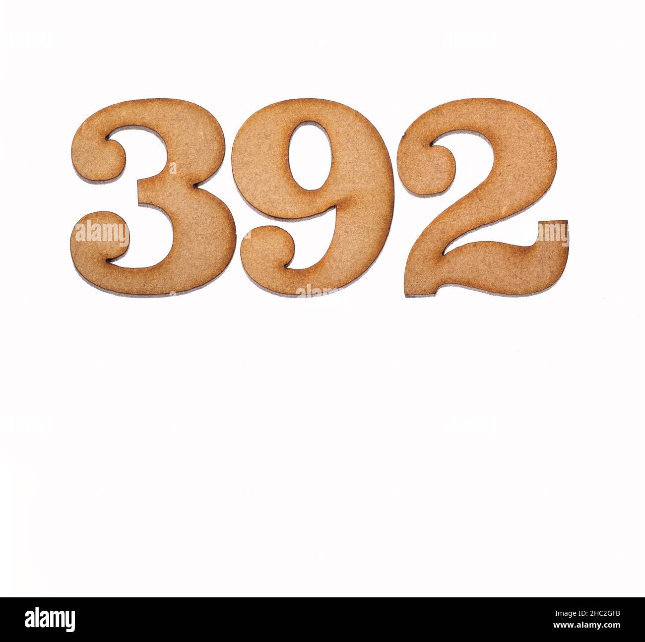 Number 392 in wood, isolated on white background Stock Photo - Alamy