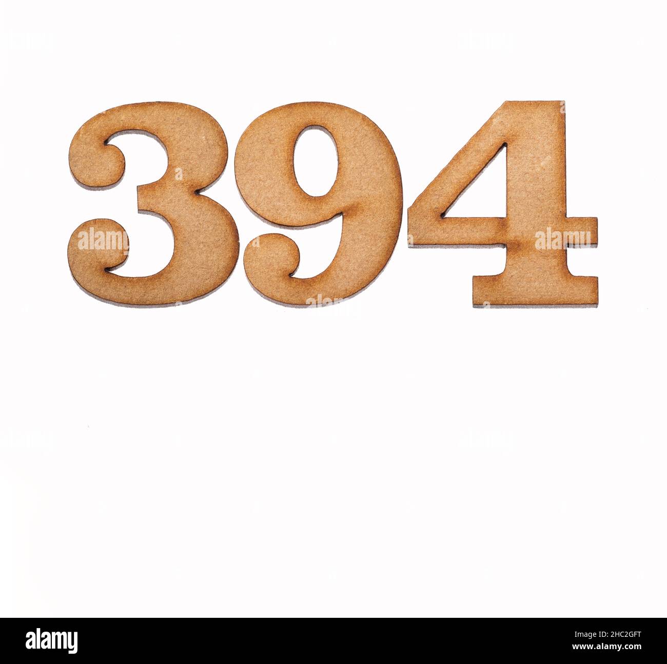 Number 394 in wood, isolated on white background Stock Photo - Alamy