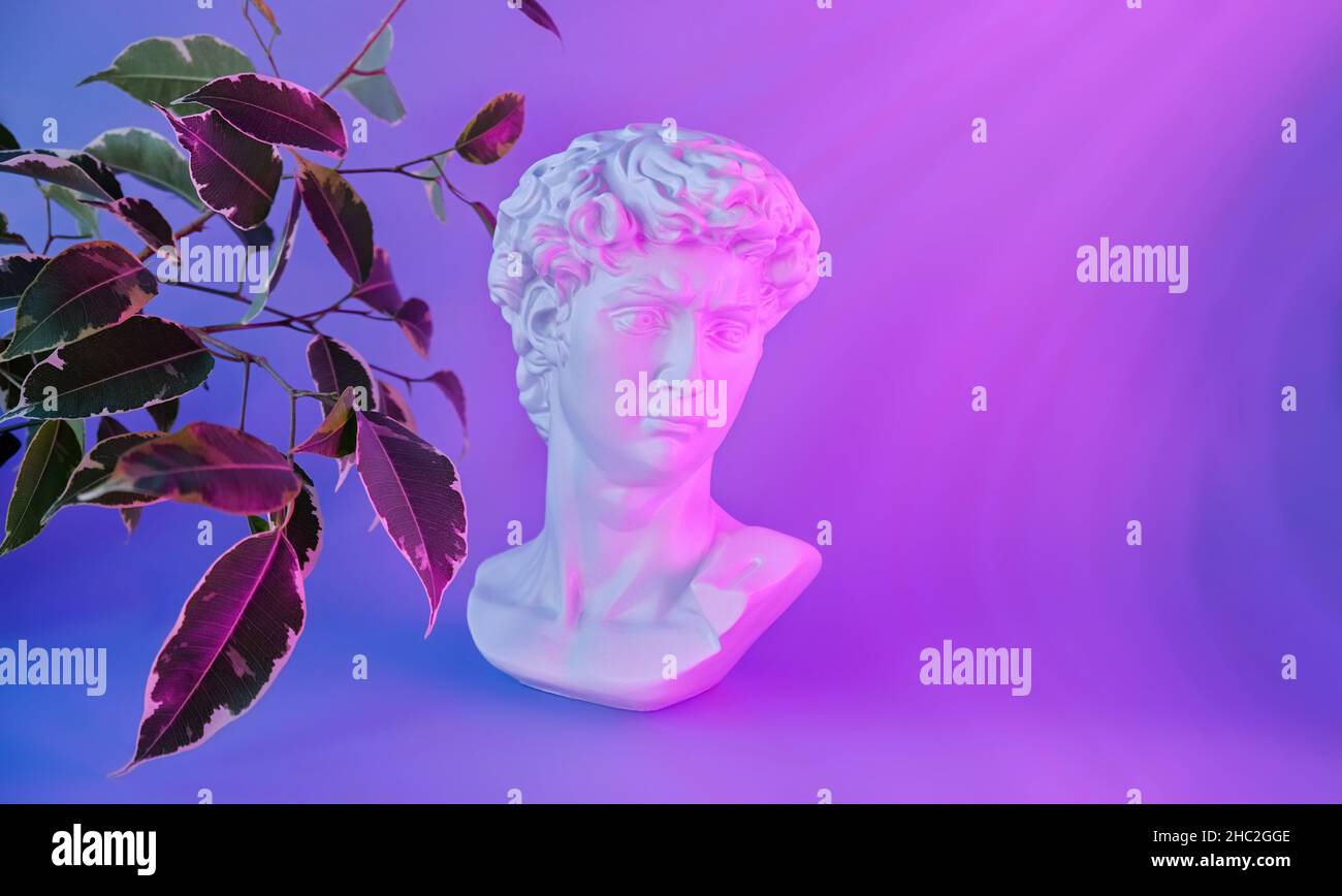 Colorful neon image with greek sculpture, surreal art style. Head of a ...