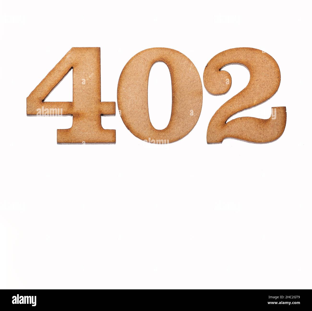 Number 402 in wood, isolated on white background Stock Photo - Alamy