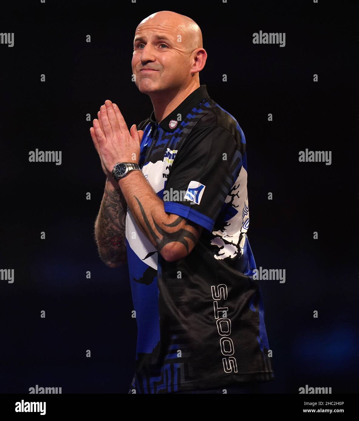 Alan Soutar reacts during day nine of the William Hill World Darts ...