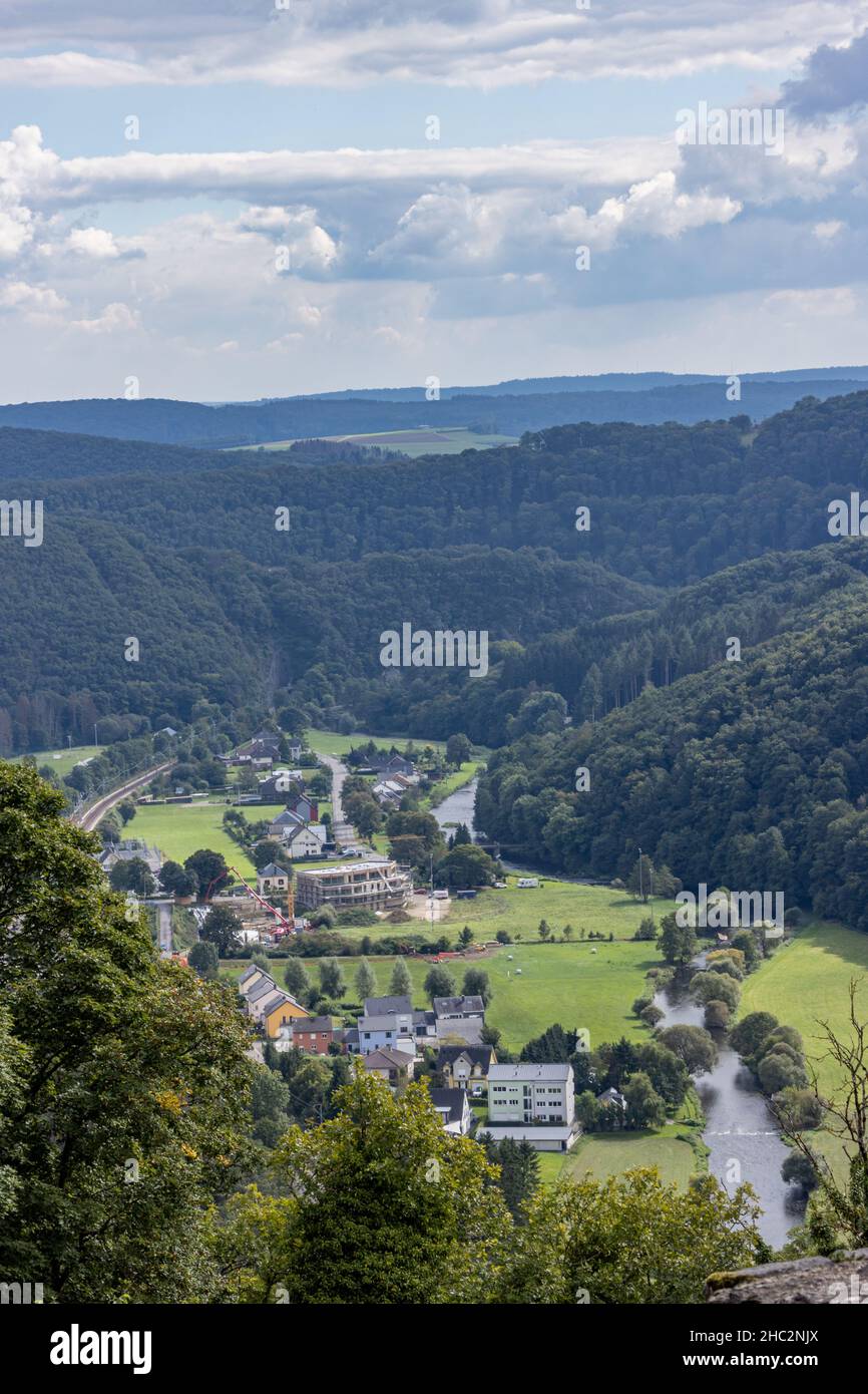 Aerial view, town of Bourscheid with its houses between a country road ...