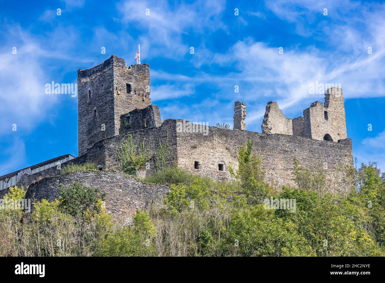 Ruined Brandenburg Castle on a promontory surrounded by small green ...