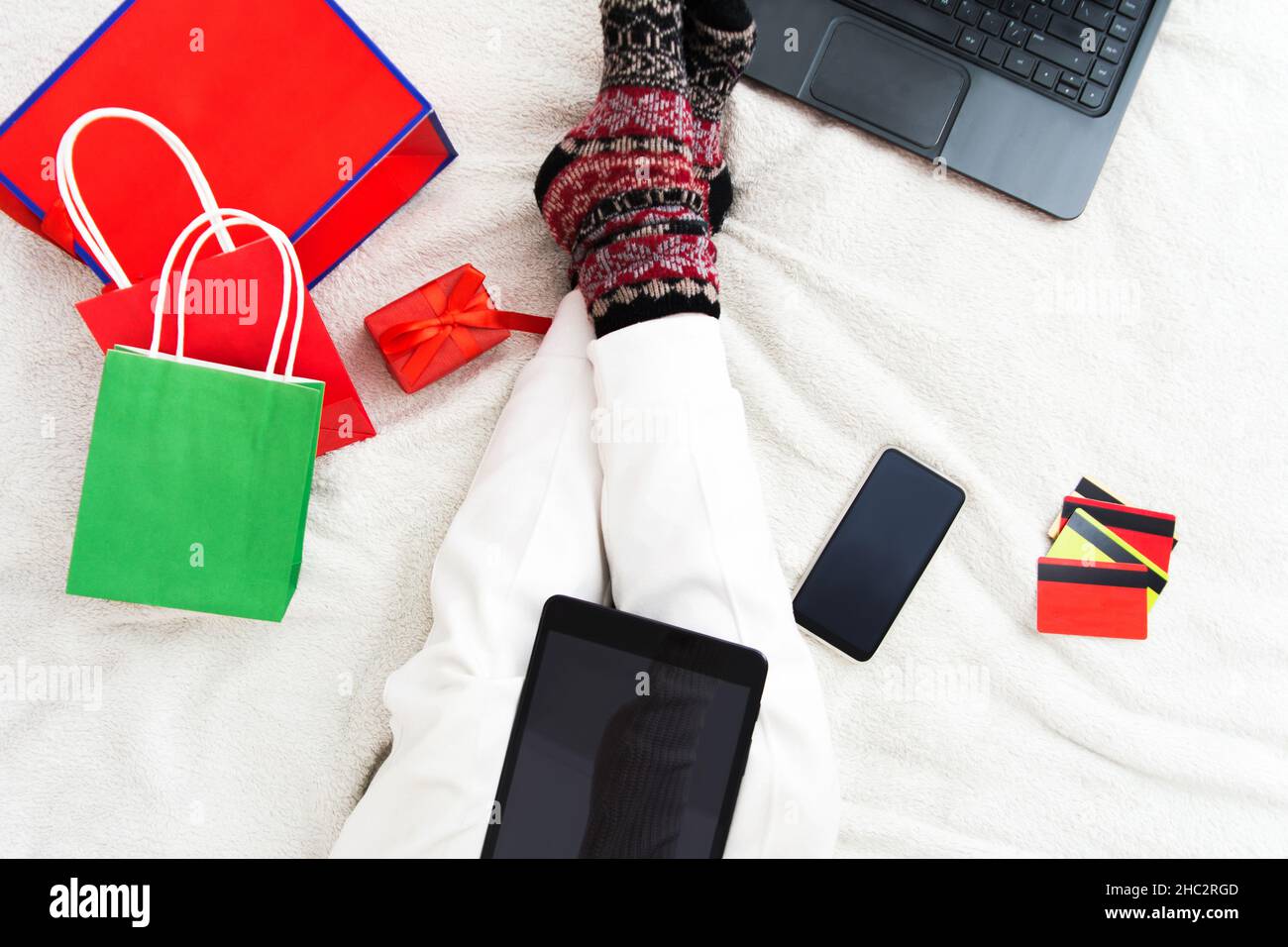 Christmas online shopping concept with internet, gift bags and cards on ...