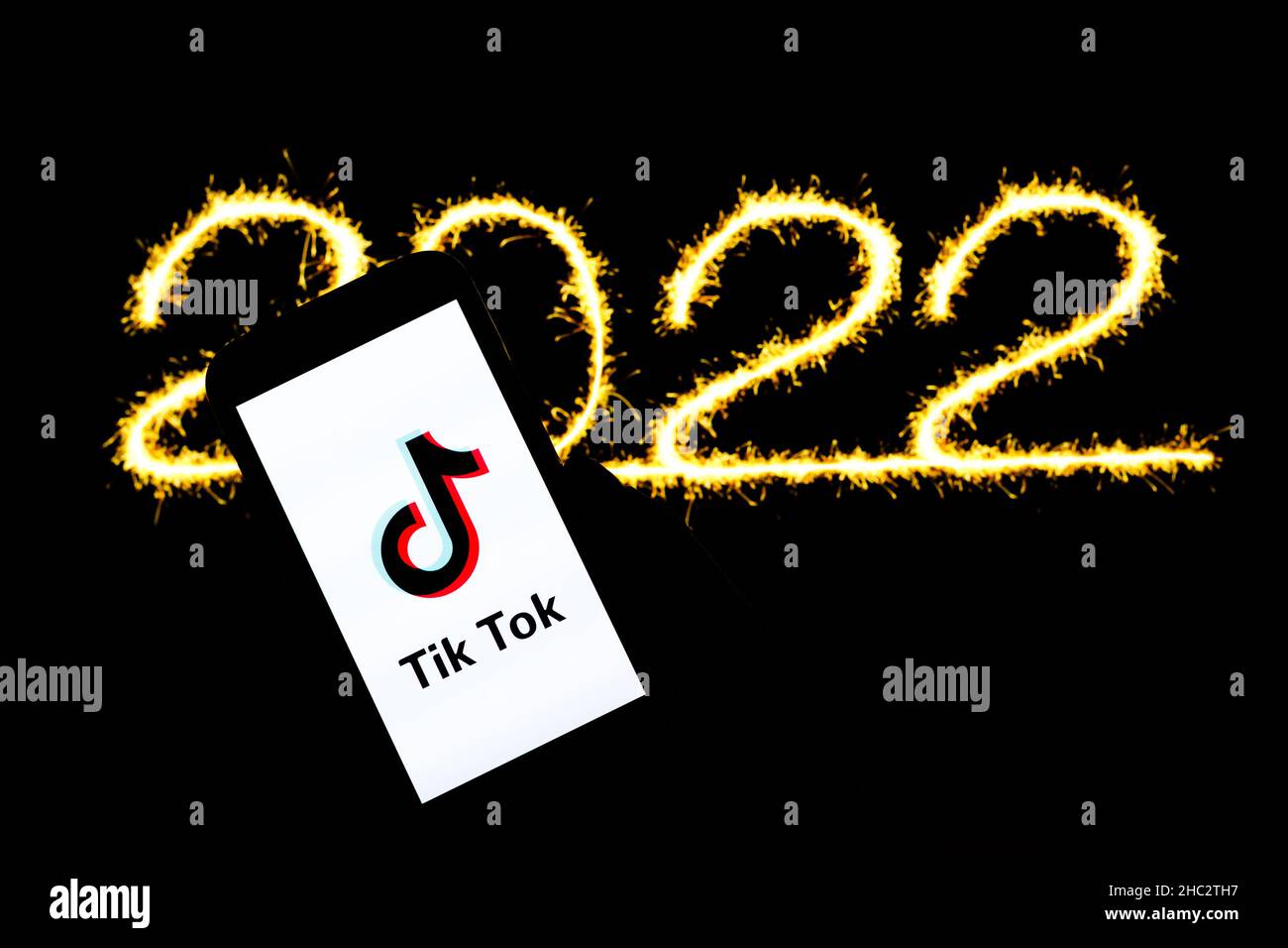 Poland. 21st Dec, 2021. In this photo illustration a Tik Tok logo seen ...