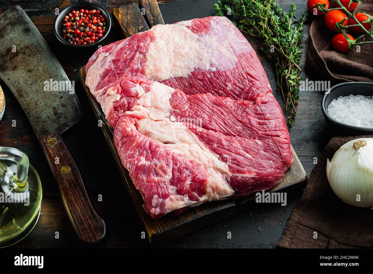 Raw brisket beef cut. Black Angus beef set,with ingredients for smoking ...