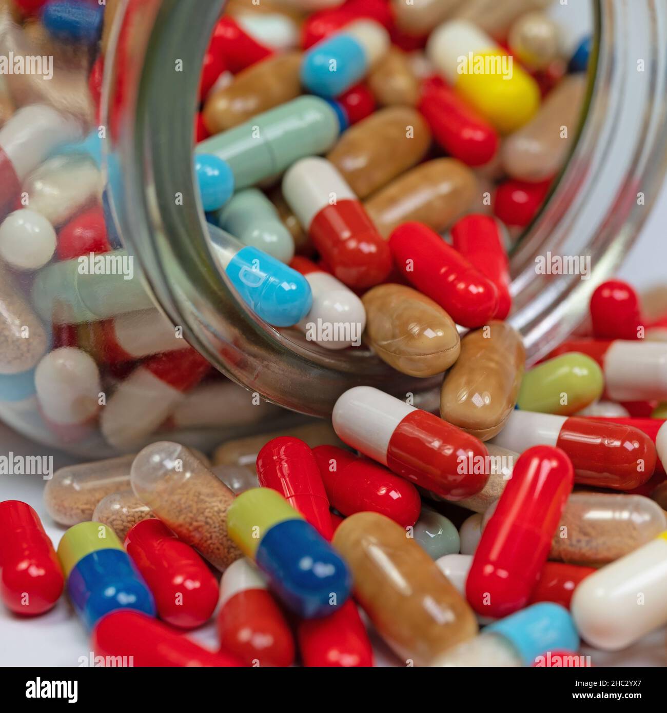 Lots of colorful capsules and tablets in a close-up Stock Photo - Alamy