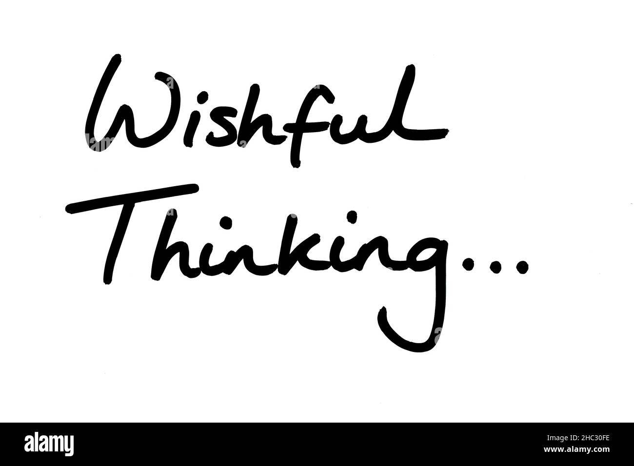 Wishful Thinking… handwritten on a white background Stock Photo - Alamy