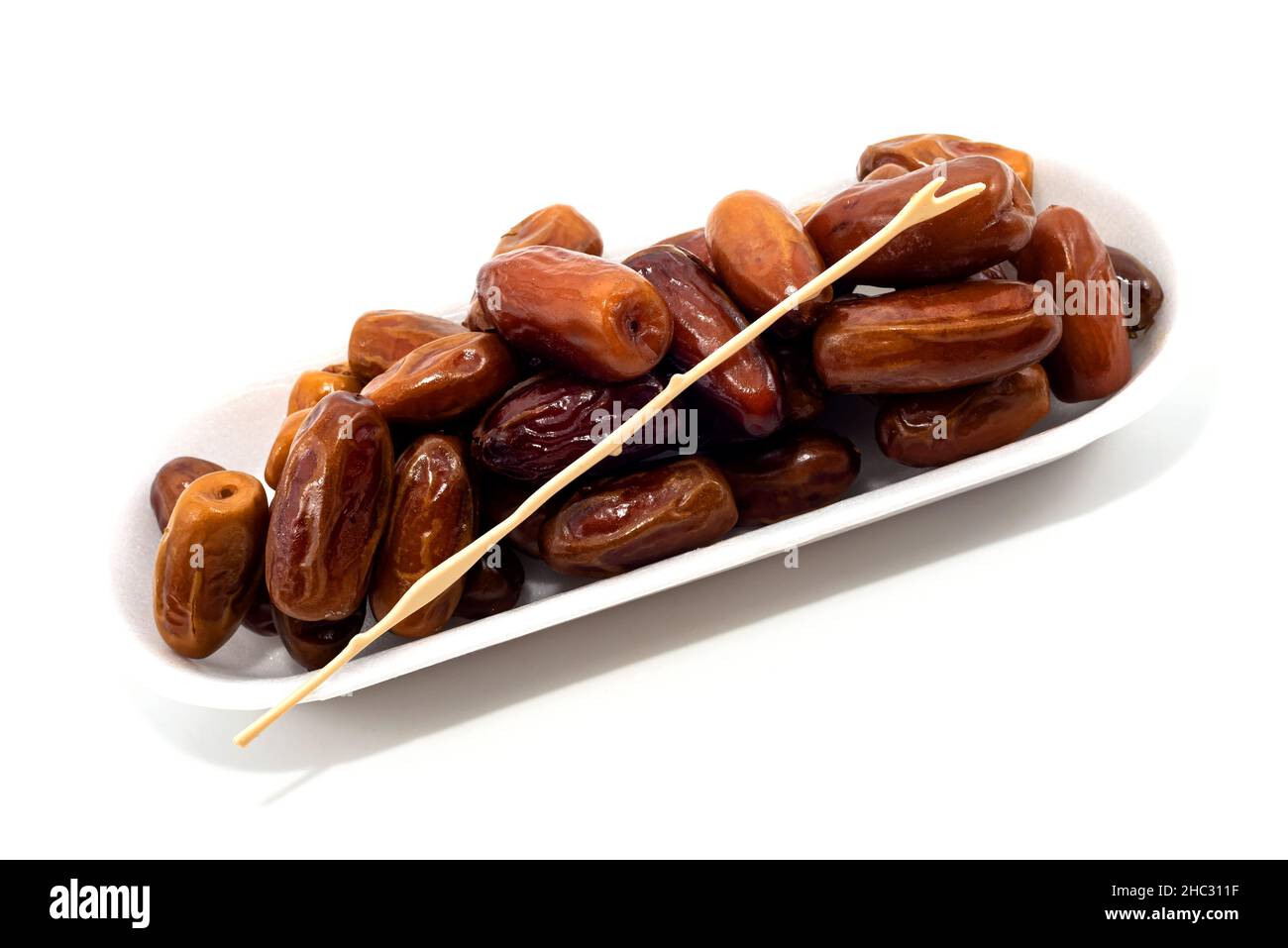 Dates in a white organic box on a white background. Date isolate Stock ...