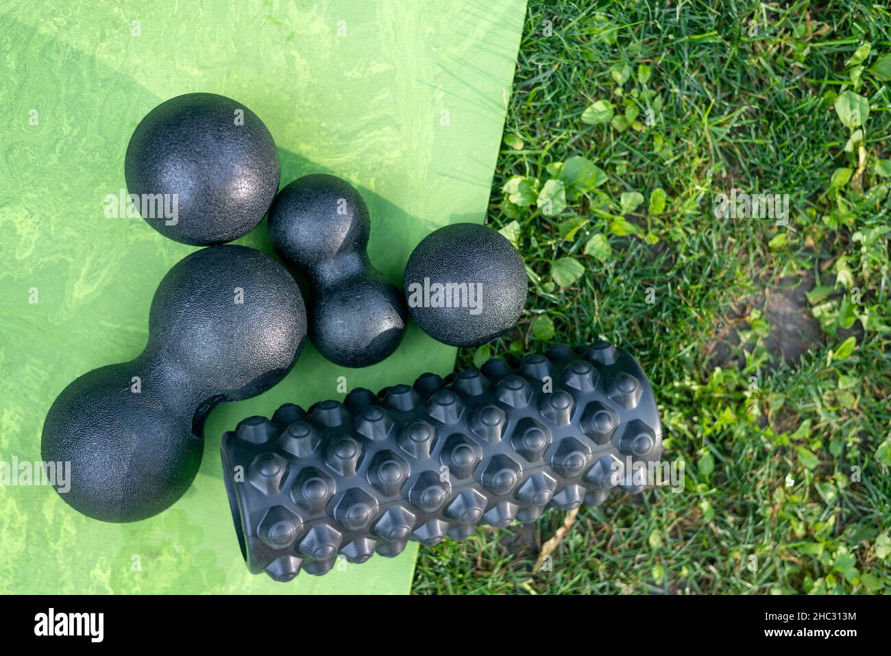Balls and roller for myofascial relaxation. Equipment for MFR. Tools ...