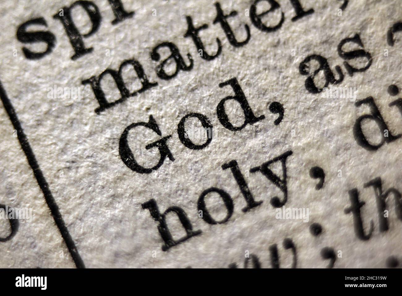 Word "God" printed on book page, macro close-up Stock Photo - Alamy