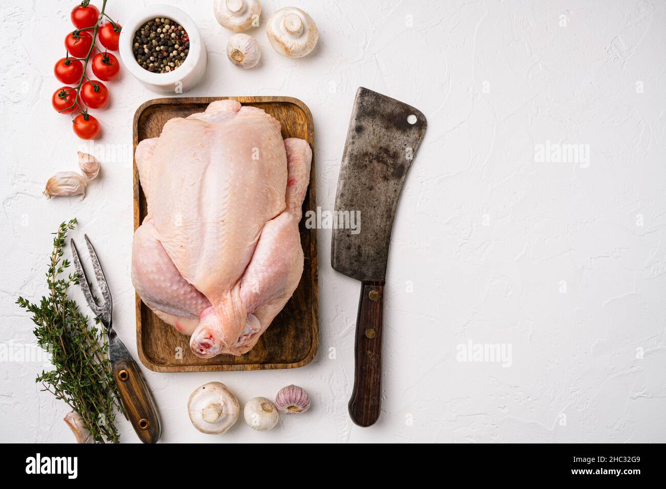 Whole chicken set, on white stone table background, top view flat lay ...