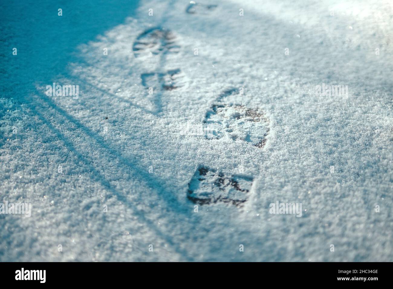 Footprint in the fresh snow. Overhead view. Texture of snow surface ...