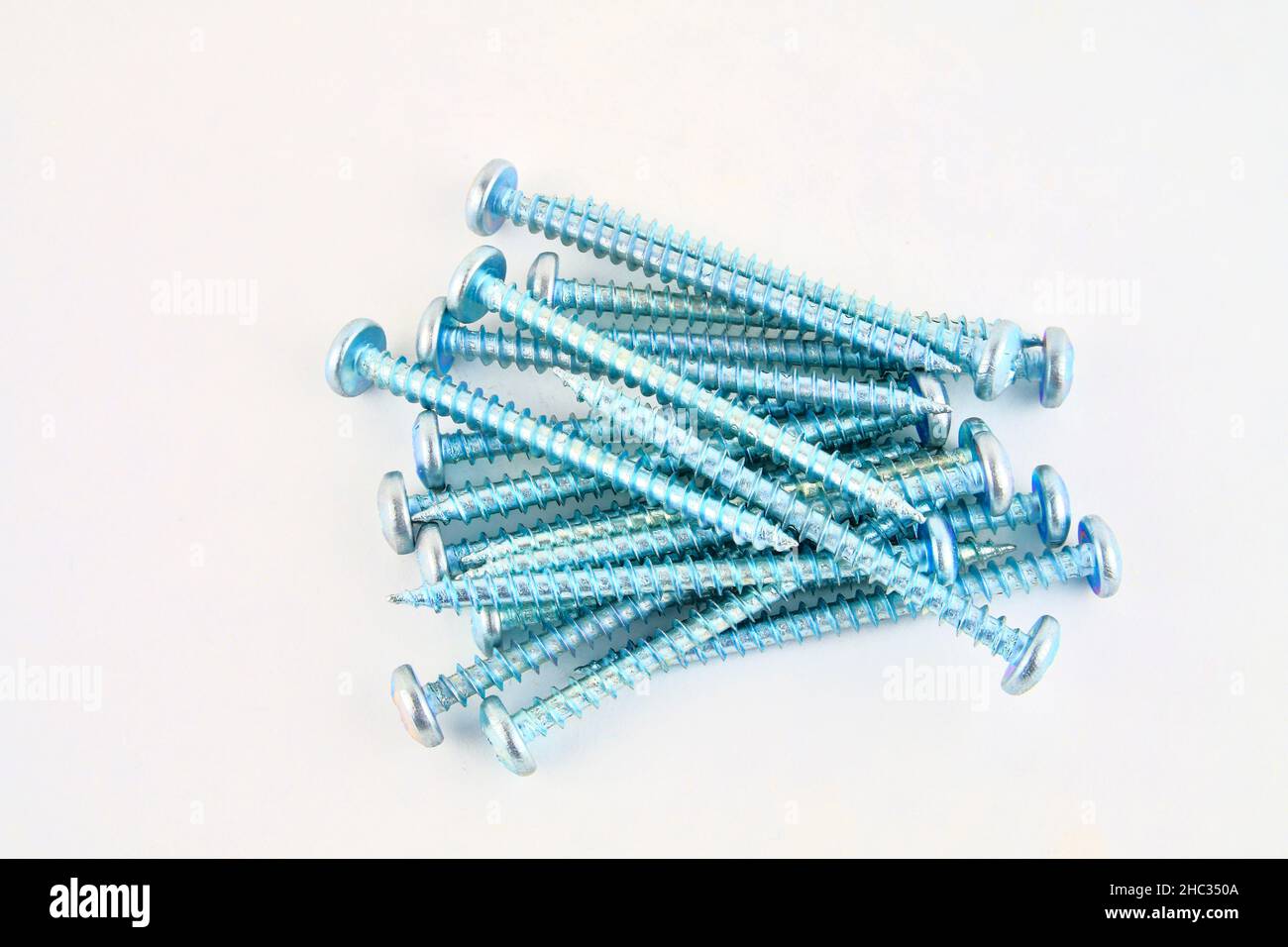 Screws for construction on a white background, metal screw, iron screw ...