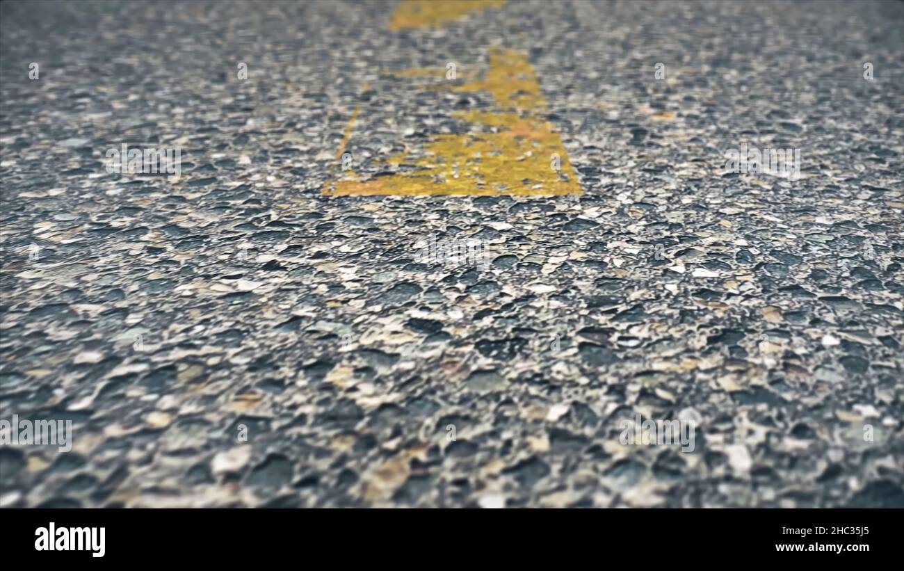 Structure of the asphalt, road marking. Close-up of animated road for ...