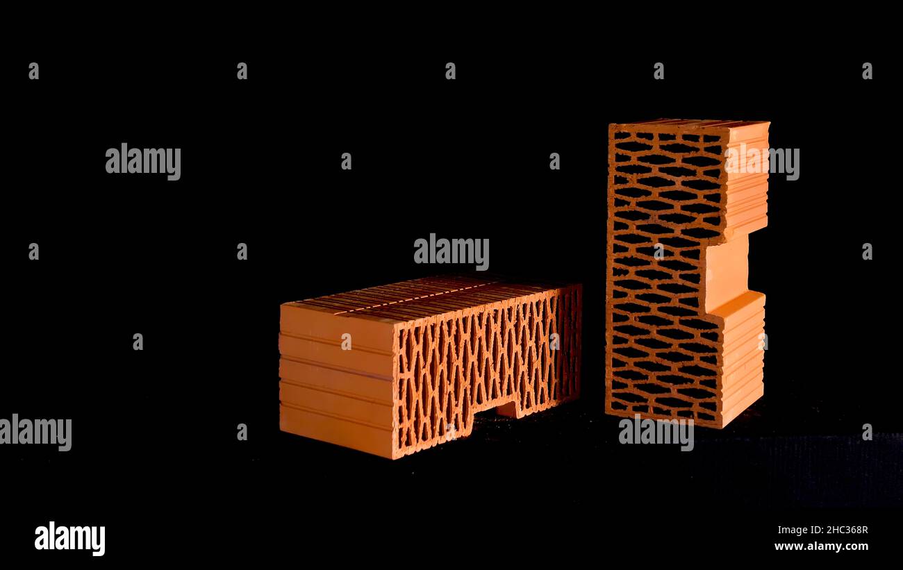 Wall construction materials, small pile of ceramic blocks isolated on ...