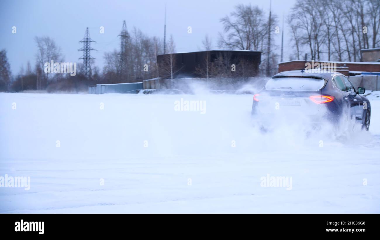 Sliding on an ice line. Snow drifting. snowy land road at winter Stock ...