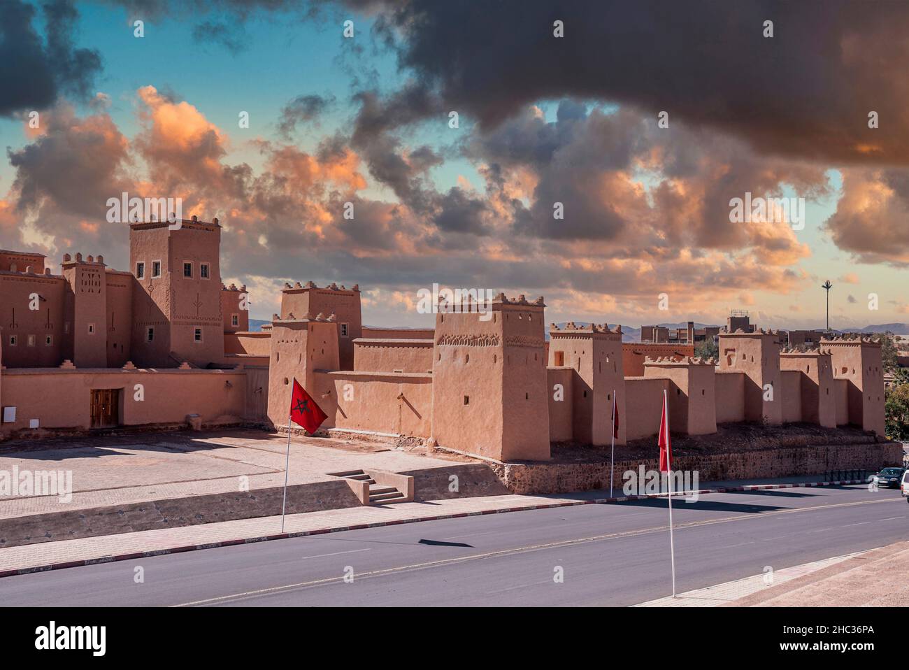 Ancient fort building with national flag on sides of road Stock Photo ...