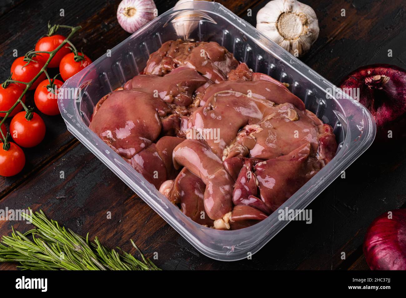 Chicken liver container set, on old dark wooden table background Stock ...
