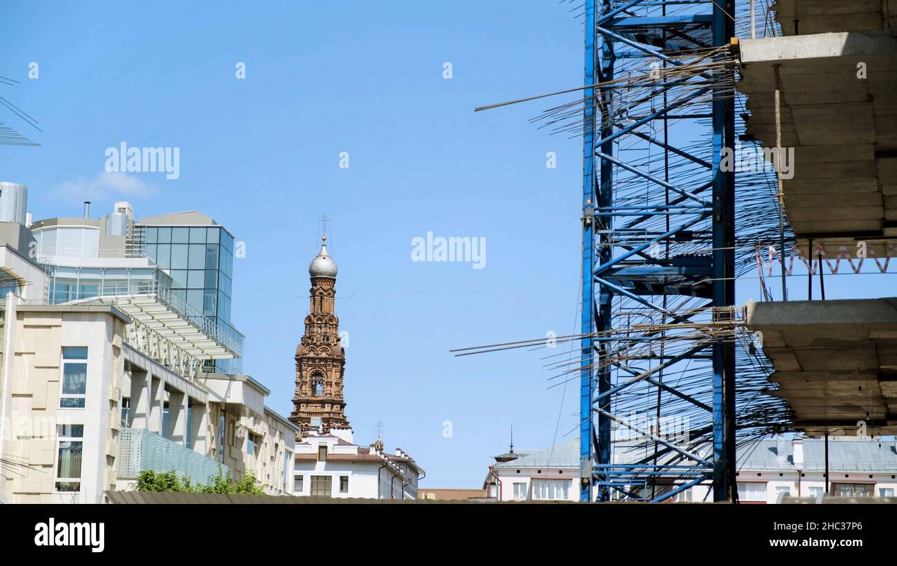 Side view of a new multi storey building under construction. The ...