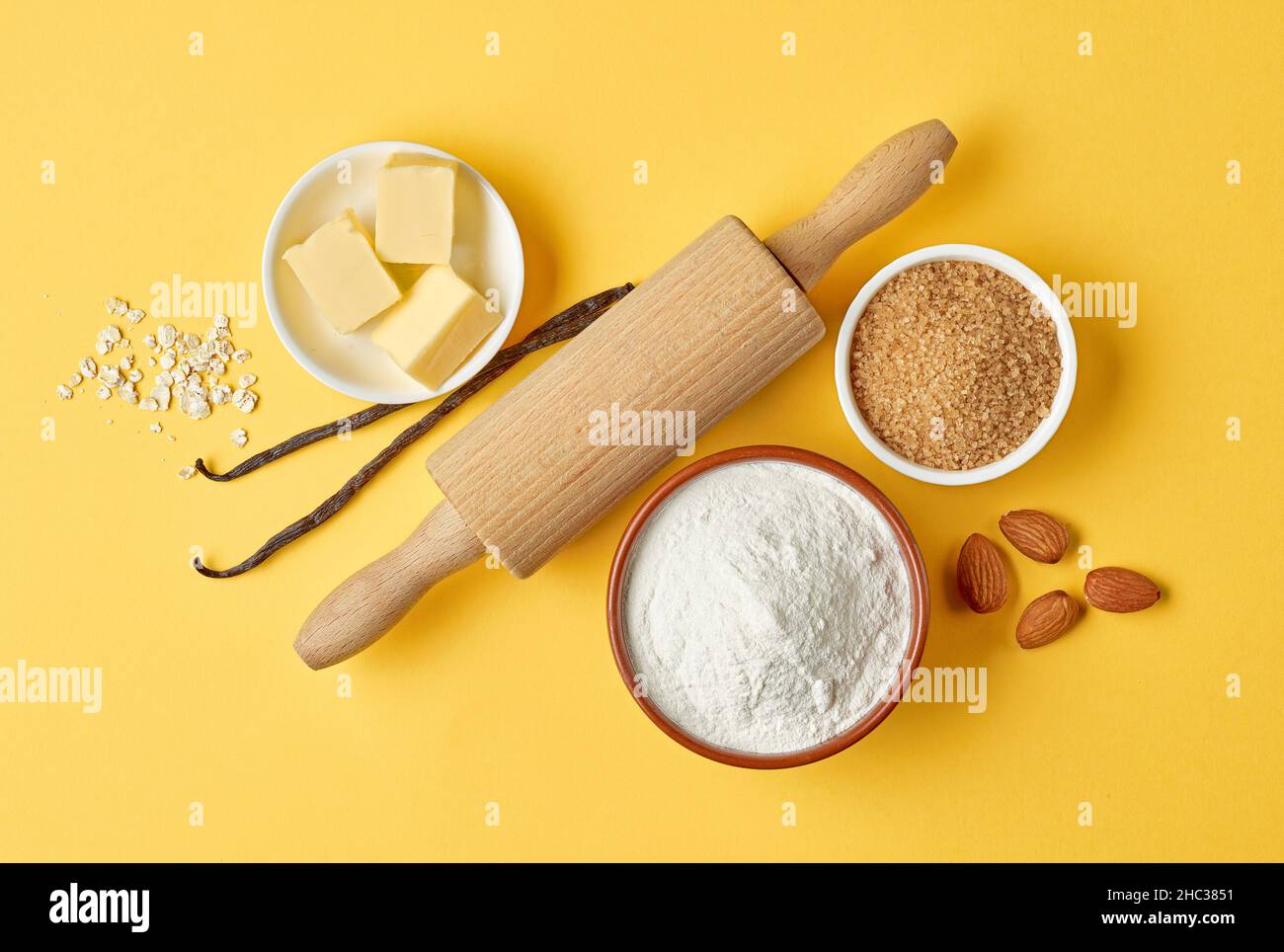 Baking ingredients on yellow hi-res stock photography and images - Alamy