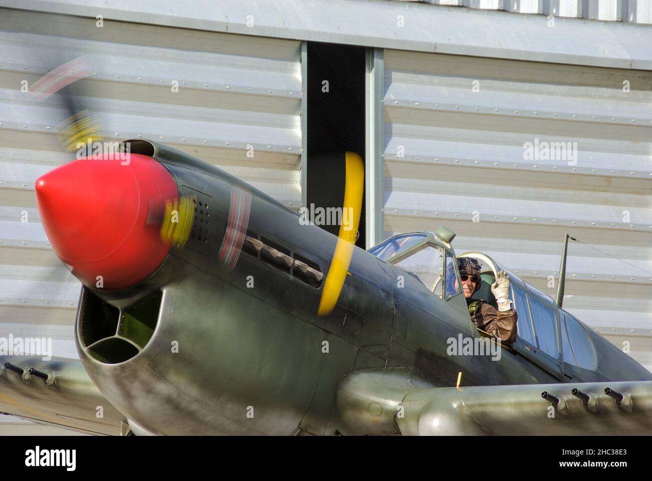Owner pilot Peter Teichman Curtiss P-40 Kittyhawk G-KITT outside Hangar ...