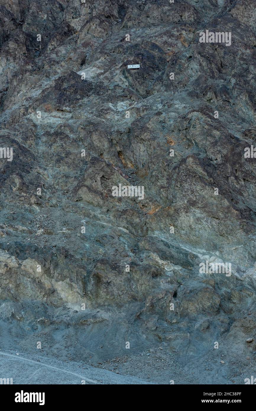 Giant Cliff At Badwater Basin With Sea Level Marked High On The Wall in ...