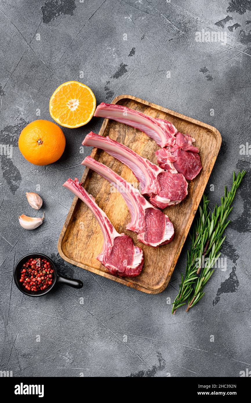 Raw fresh lamb ribs set, on gray stone table background, top view flat ...