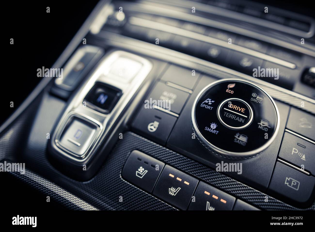 Close up shot of a modern car drive mode selector button, on the ...