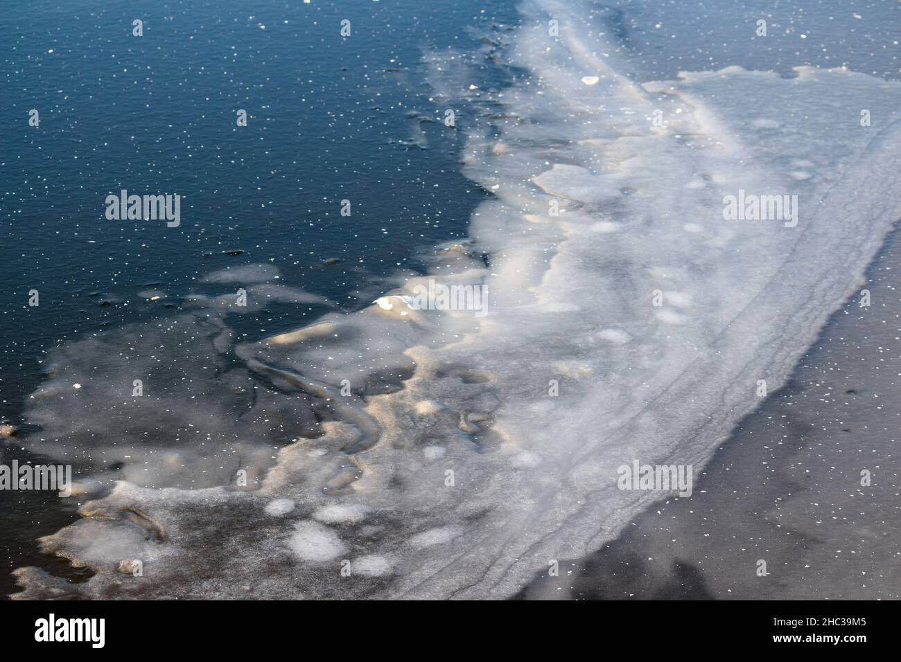 Abstract streaks on river ice, beautiful icy background Stock Photo - Alamy