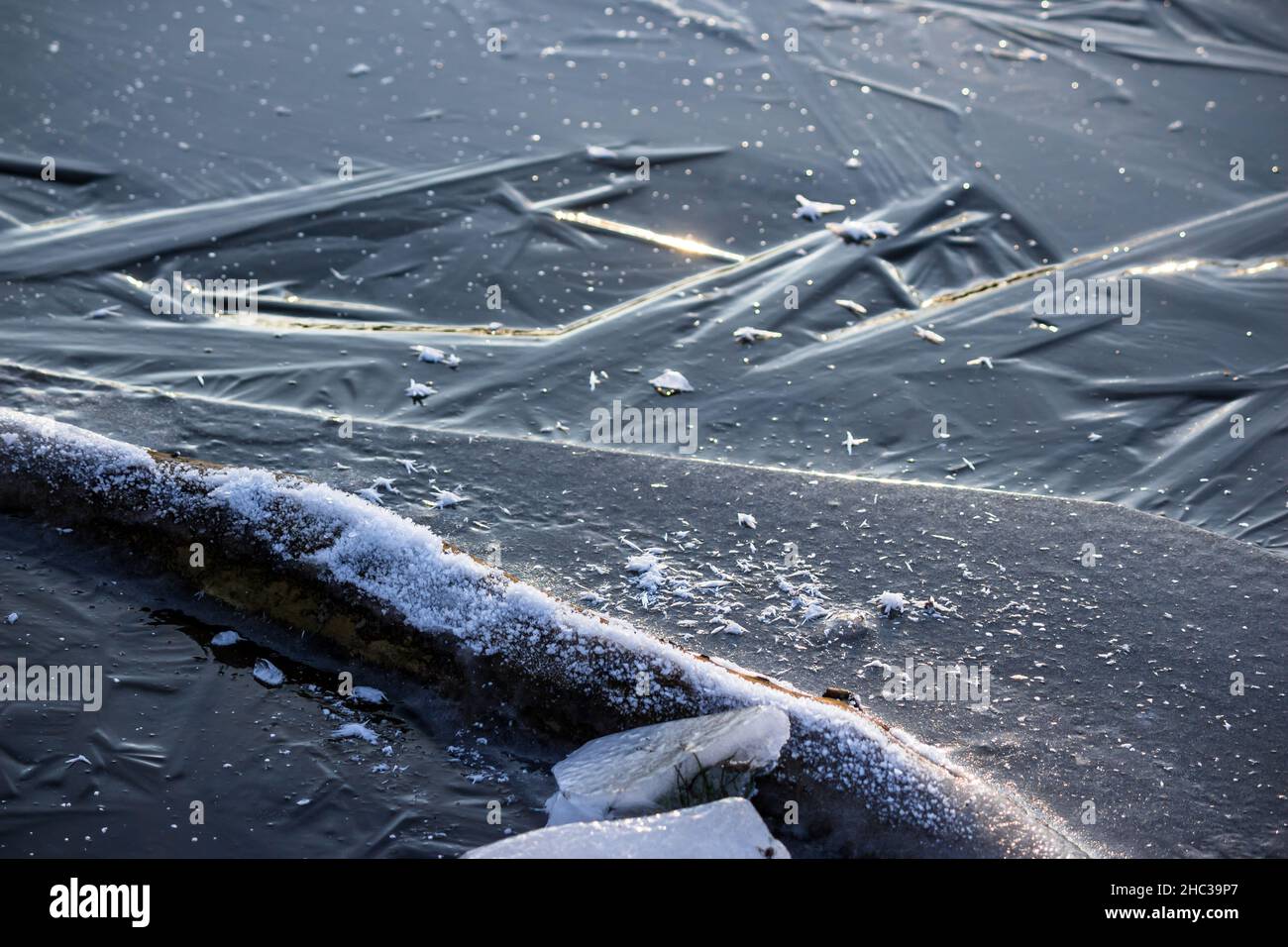 Texture of thin river ice, blue-gray background Stock Photo - Alamy